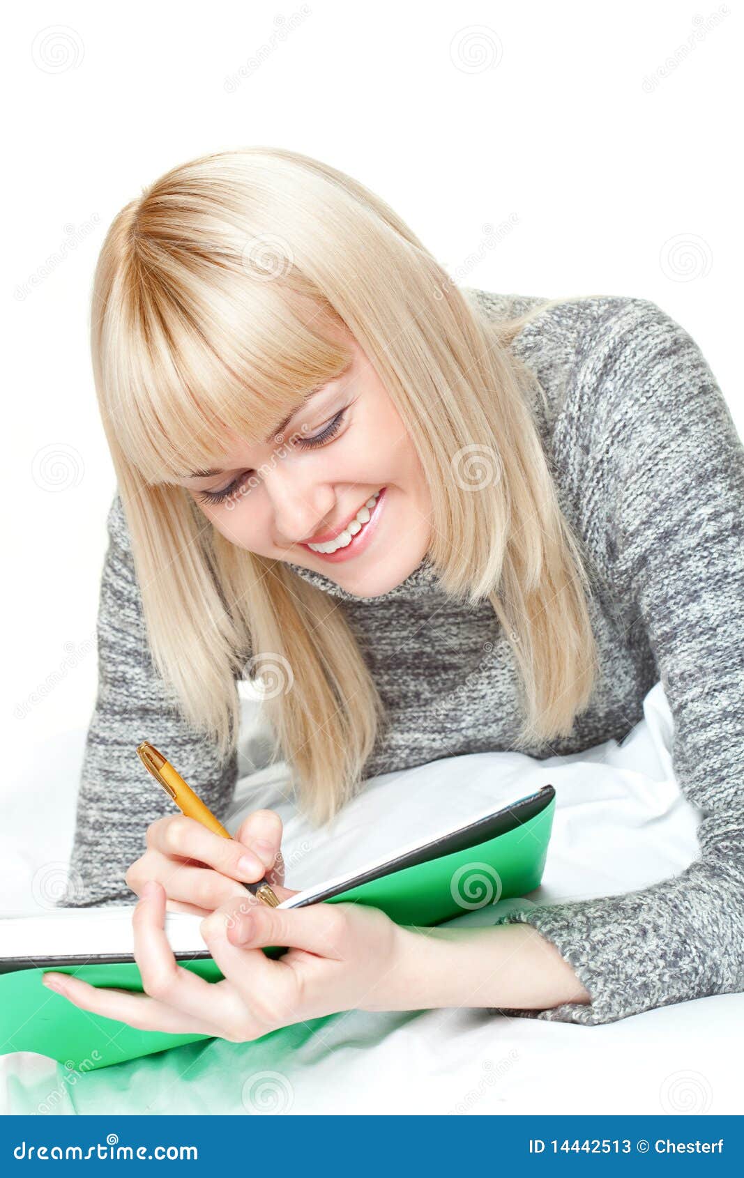 Woman writing and smiling stock image. Image of person - 14442513
