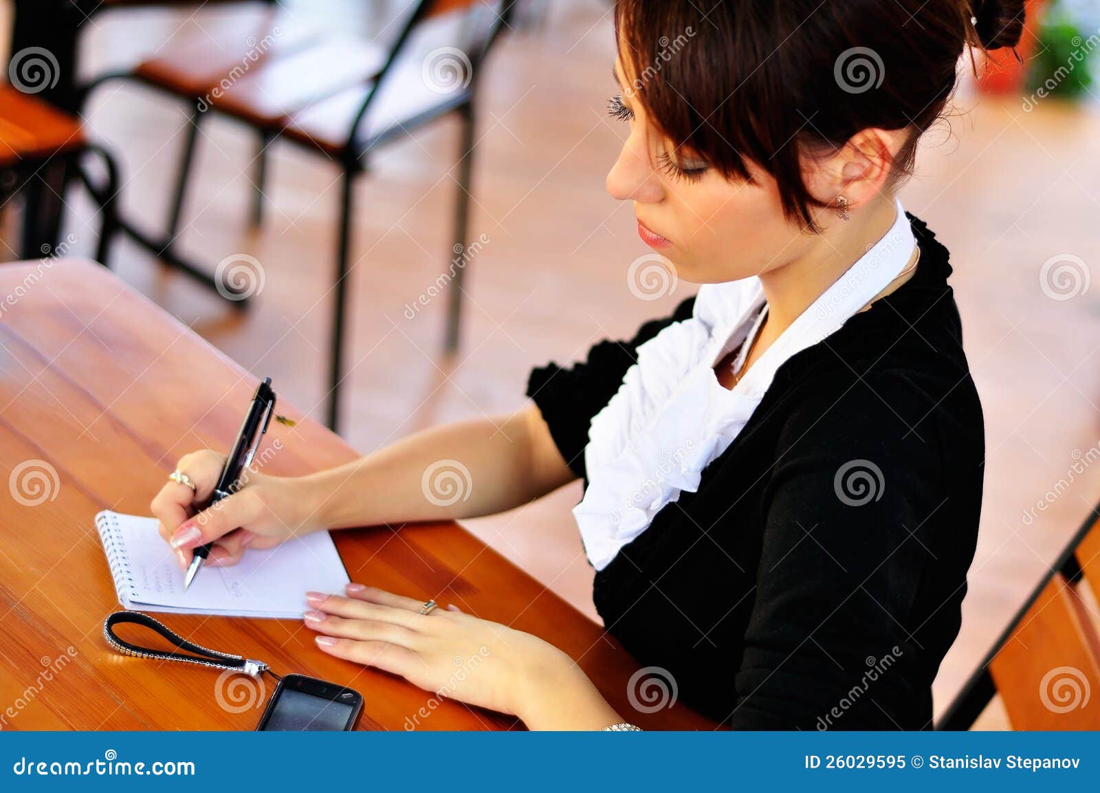Woman Writing Something To the Notebook Using Pen Stock Image - Image ...