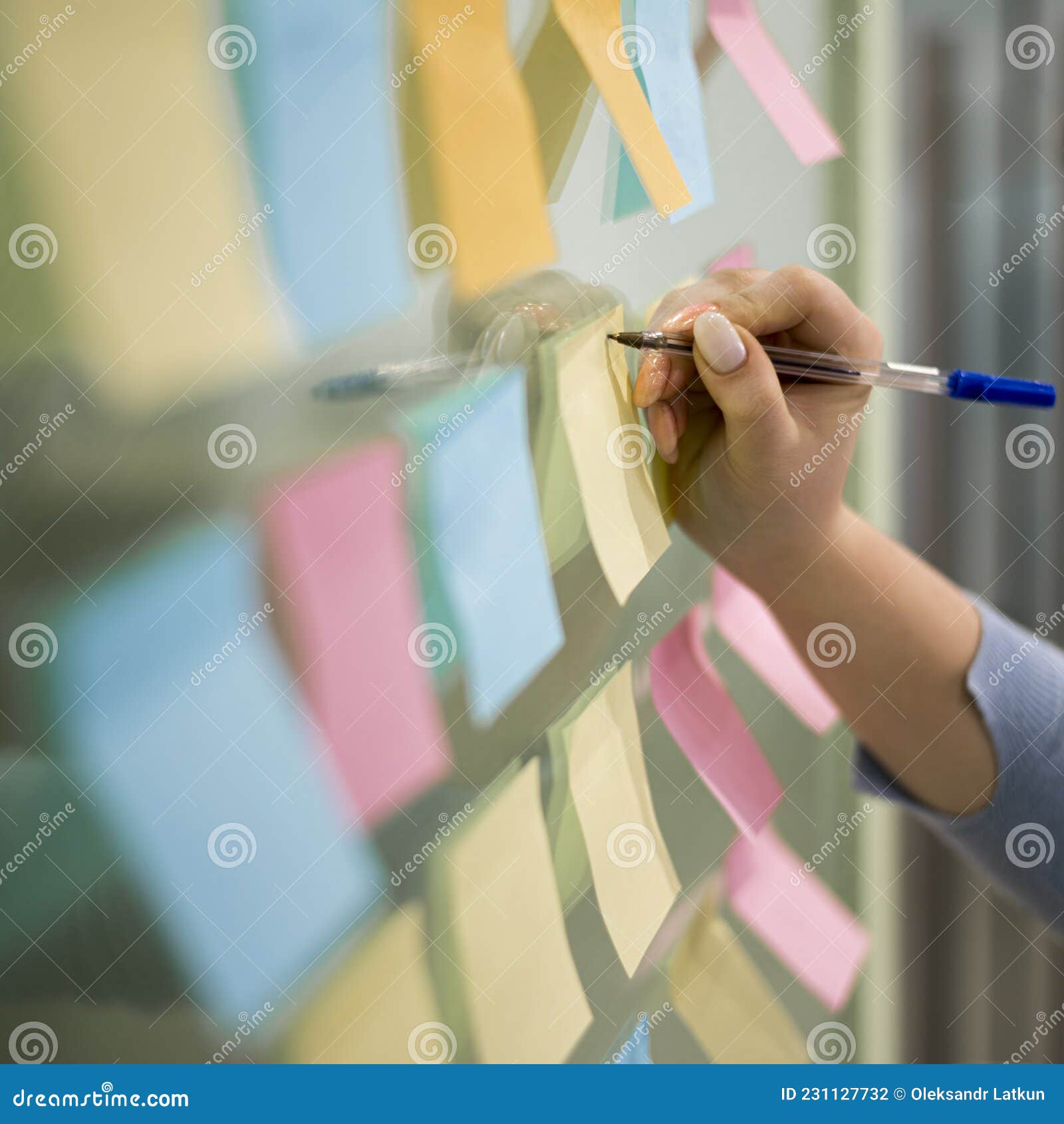 Woman Writing Sticky Notes Office Window. High Quality Photo Stock ...