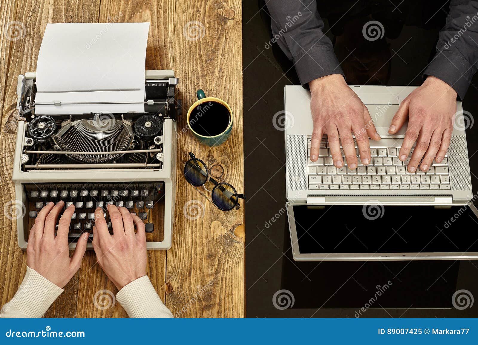 Woman Writing on a Typewriter and a Man Working on a Laptop.Closeup To ...