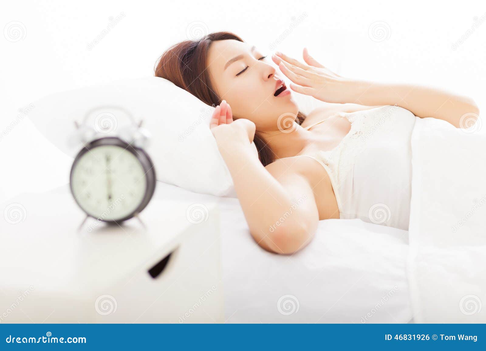 Woman Yawn and Asleep in the Bed Stock Photo - Image of indoor, alarm ...