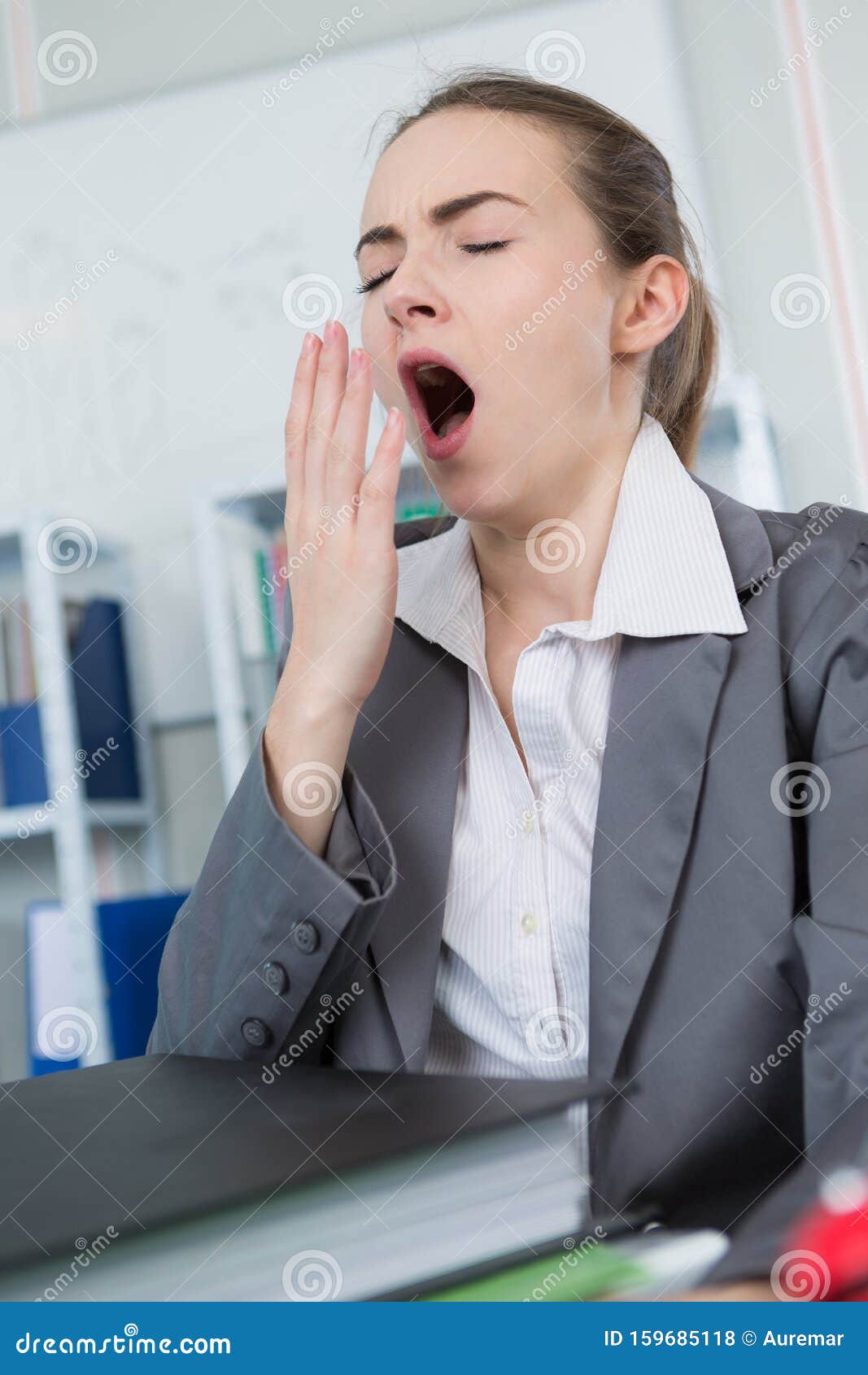 Woman Yawning at Office Desk Stock Photo - Image of caucasian, yawn ...