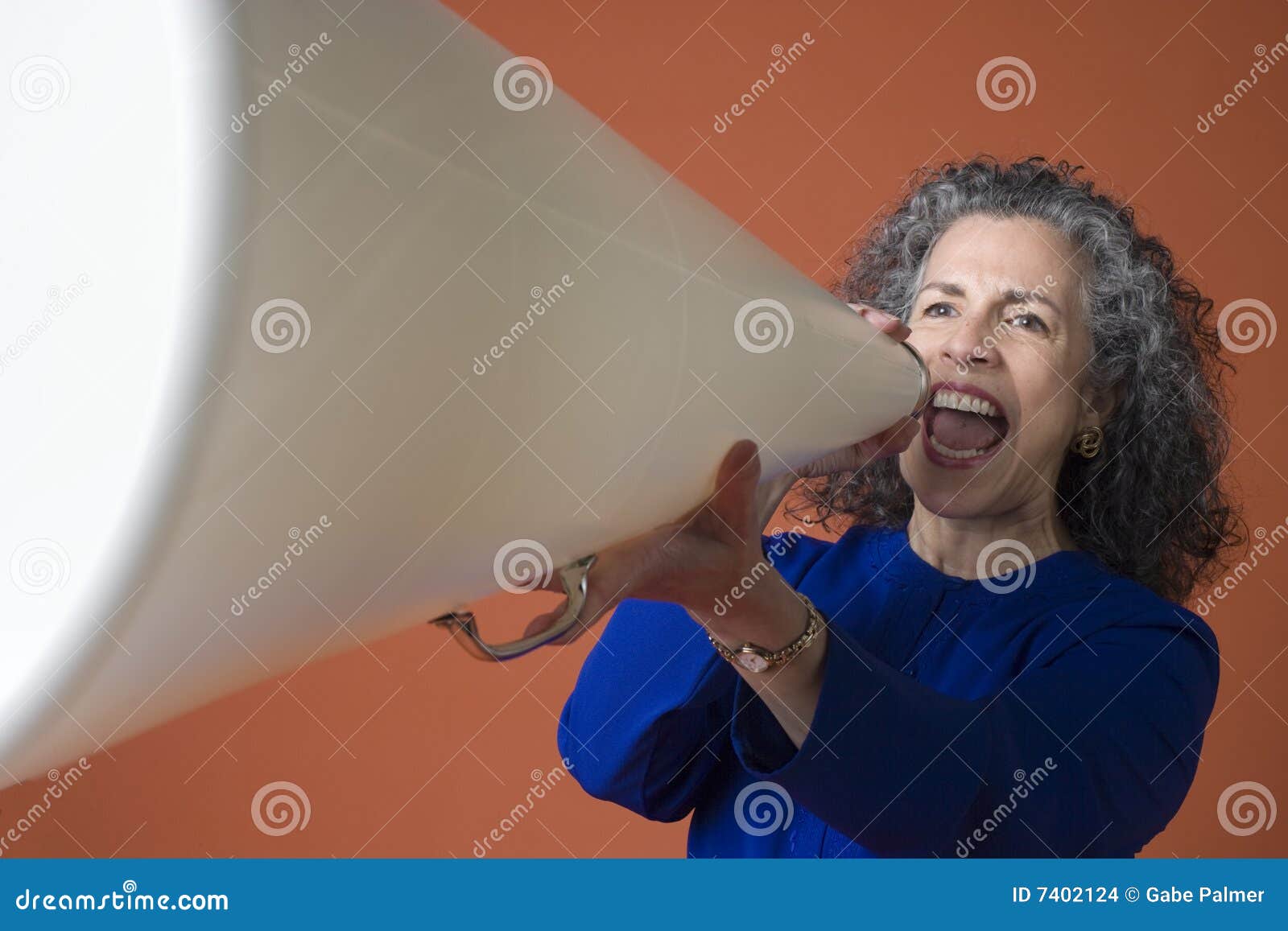 Woman Yells into a Megaphone Stock Photo - Image of communication ... Woman Yells into a Megaphone Stock Photo - Image of communication ...