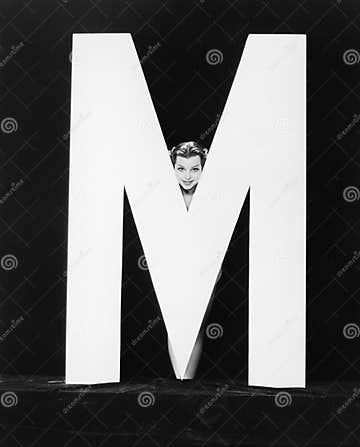 Womans Face with Huge Letter M Stock Image - Image of hidden, faces ...