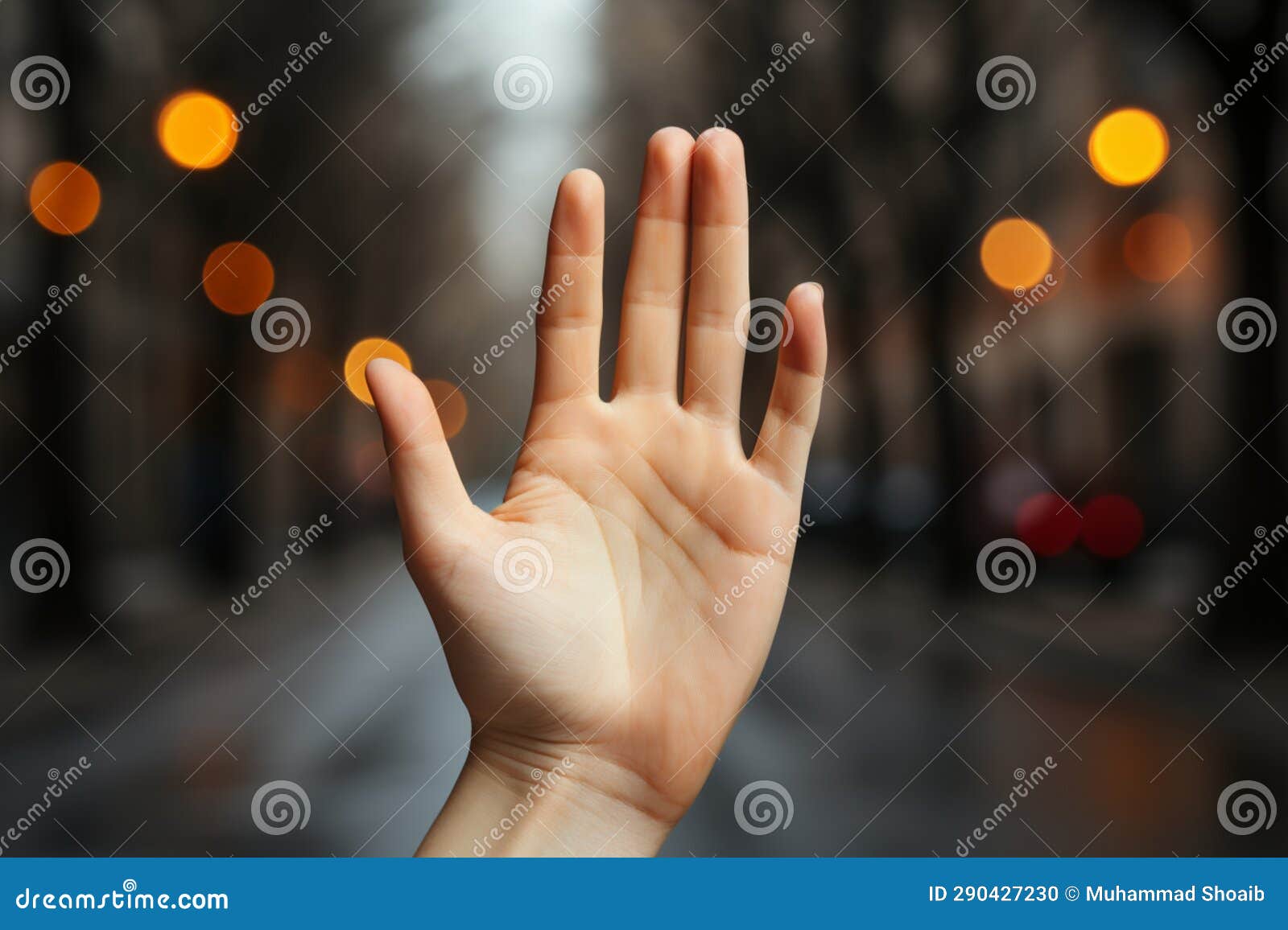 A Womans Hand Forms a Stop Sign, Mimicking a Red Traffic Light Stock ...