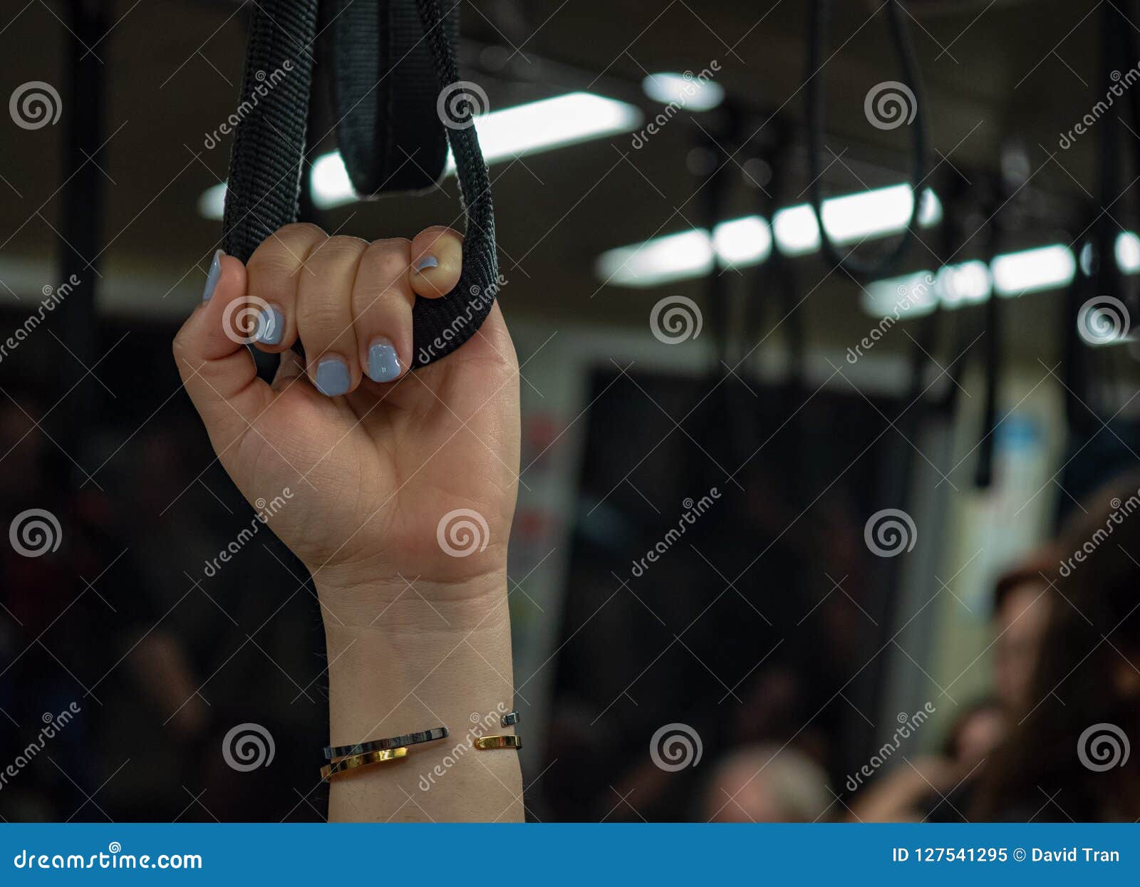 Womans Hand Holding Handrail Handle on Crowded Subway Training Stock ...