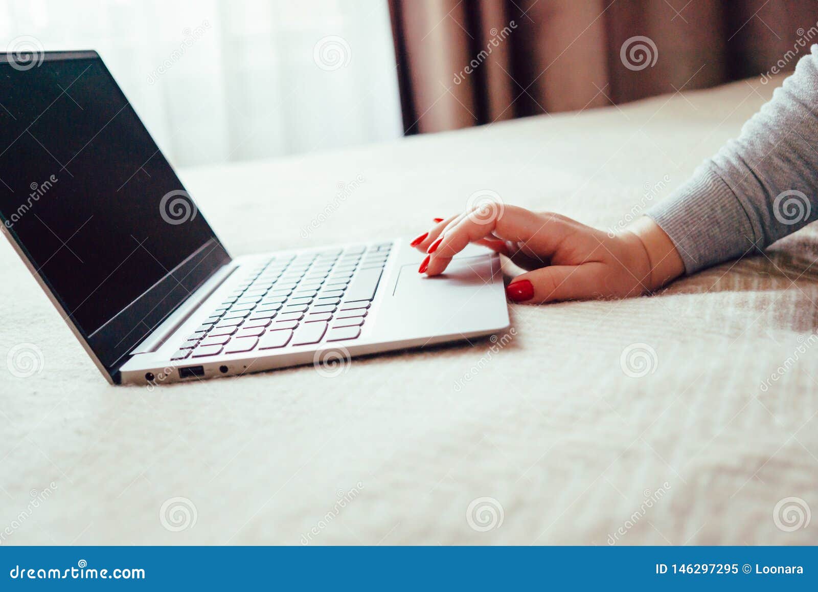 Womans Hand with Red Nails on Laptop Keyboard, Lady Using Laptop on Bed ...