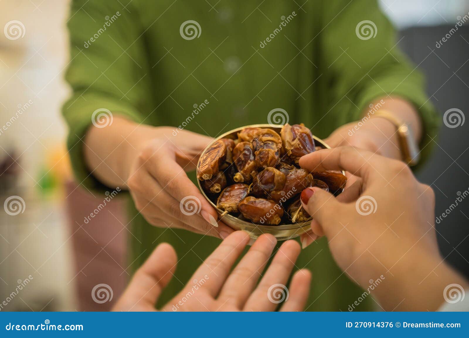 Womans Hand Serves a Bowl of Dates for Iftar Stock Photo - Image of ...