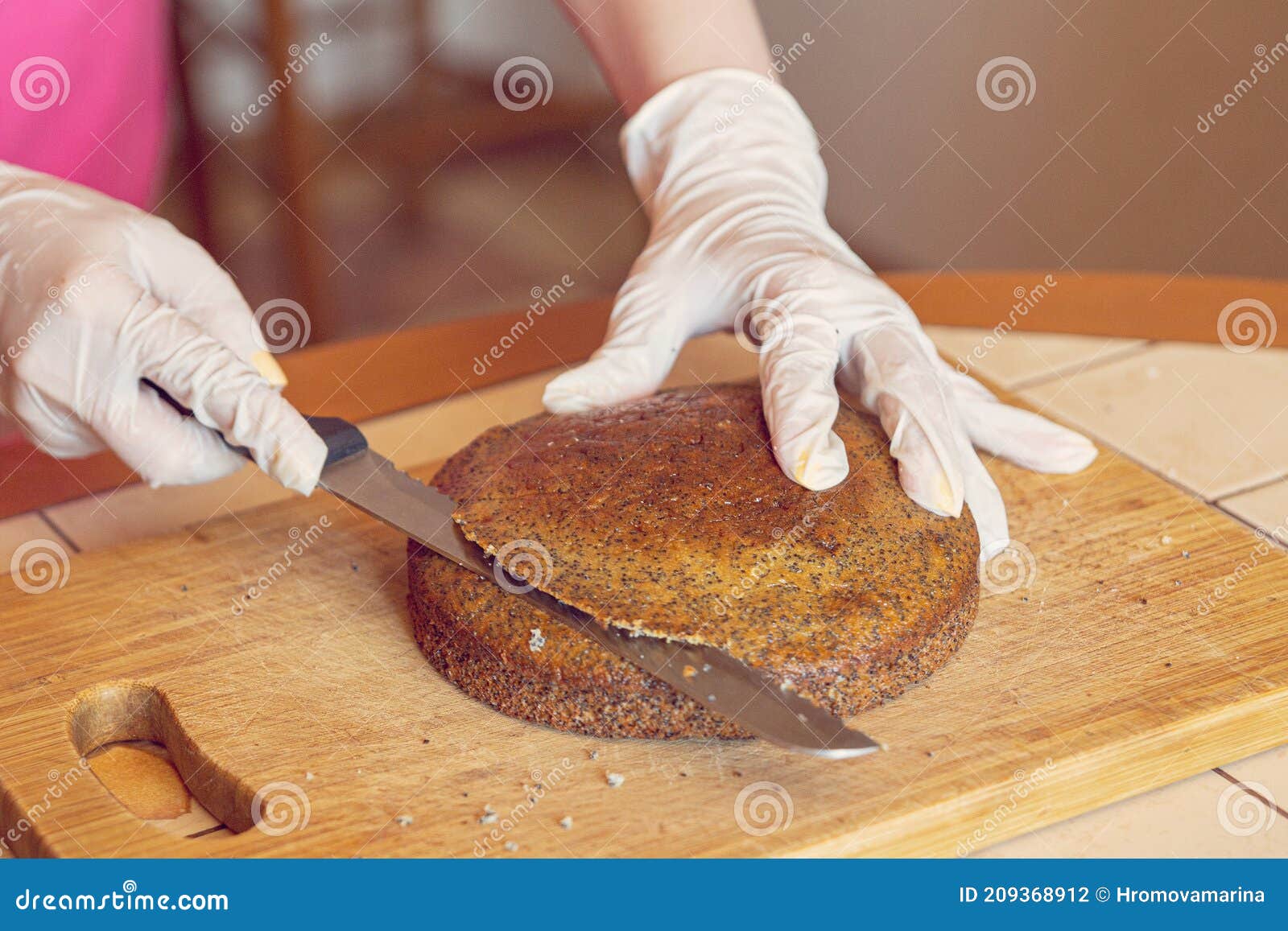 Womans Hands Chef Cutting Chocolate Cake Layers and Stacking Them Stock ...