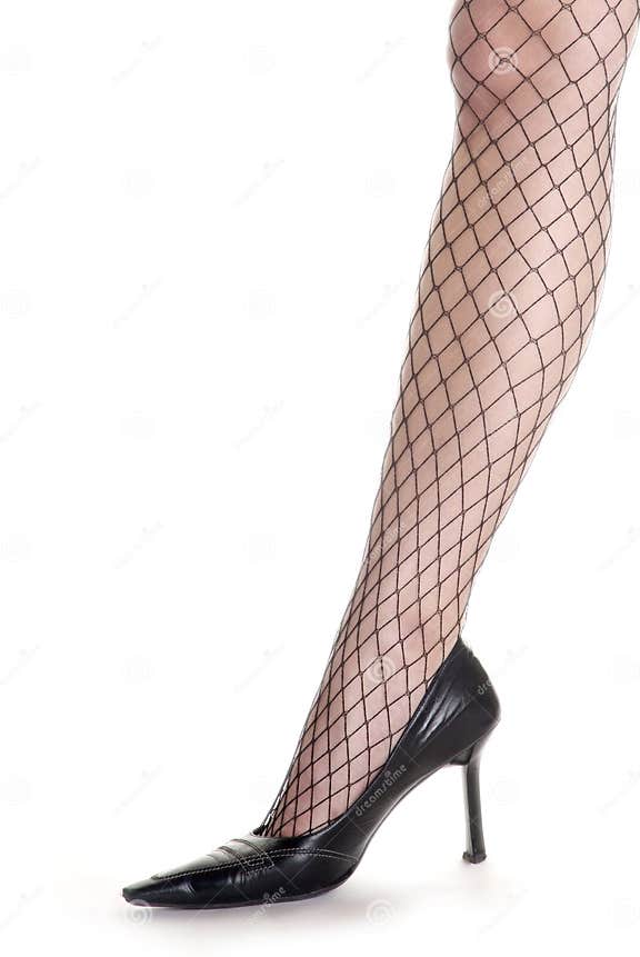 Womans Leg and Net Stocking Stock Photo - Image of confident, assured ...