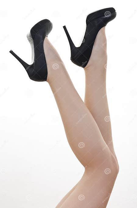 Womans legs in the air stock photo. Image of high, black - 23936702
