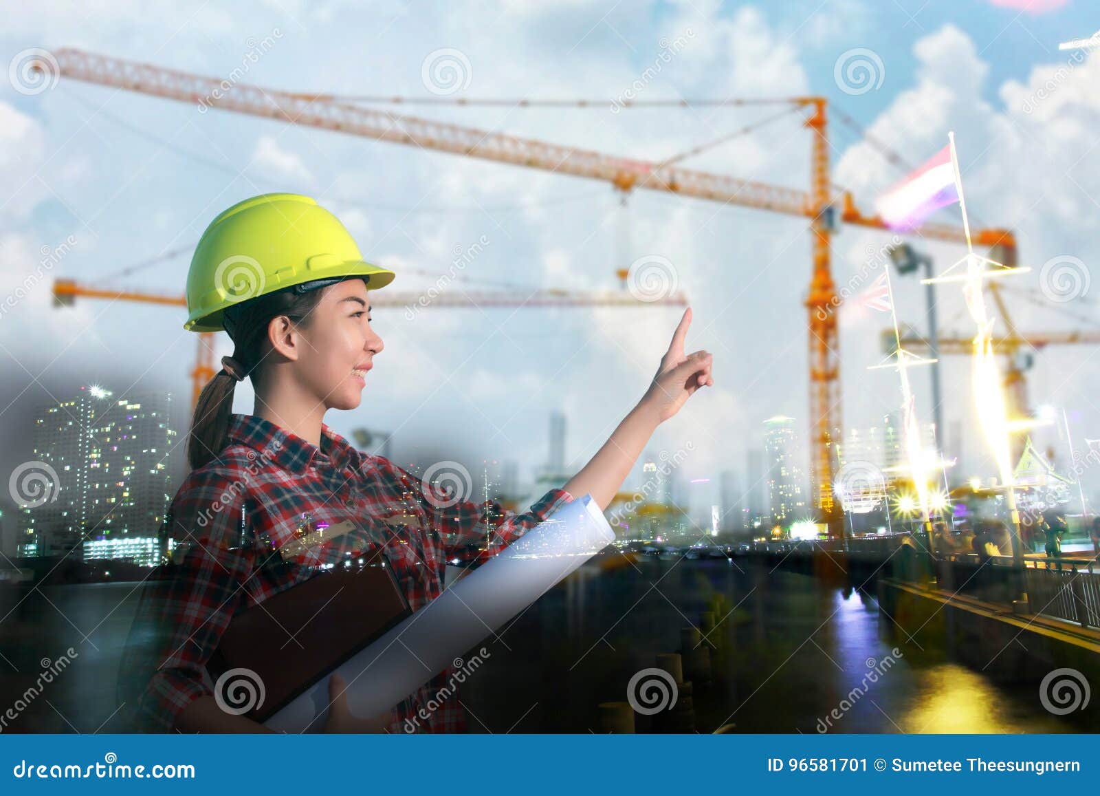Women Asia Engineer Working and Holding Blueprints at Construction Site ...