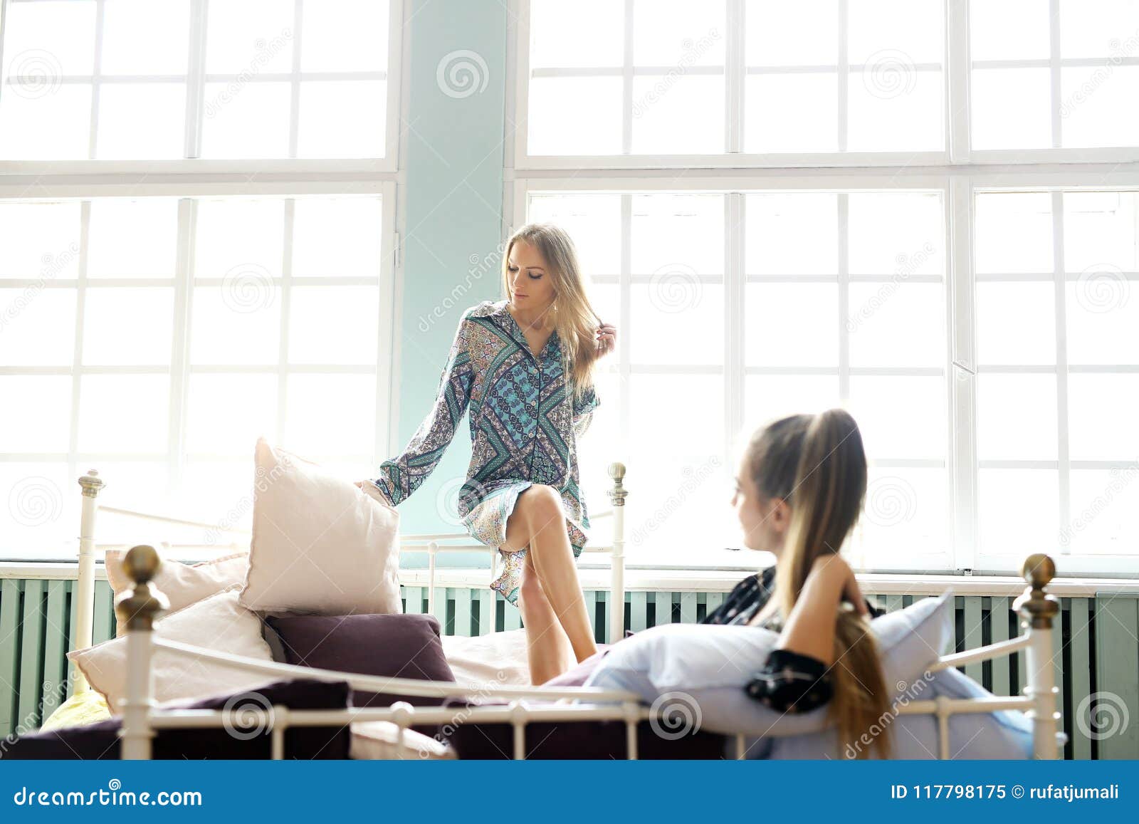 Women in bed stock image. Image of bedtime, daytime - 117798175