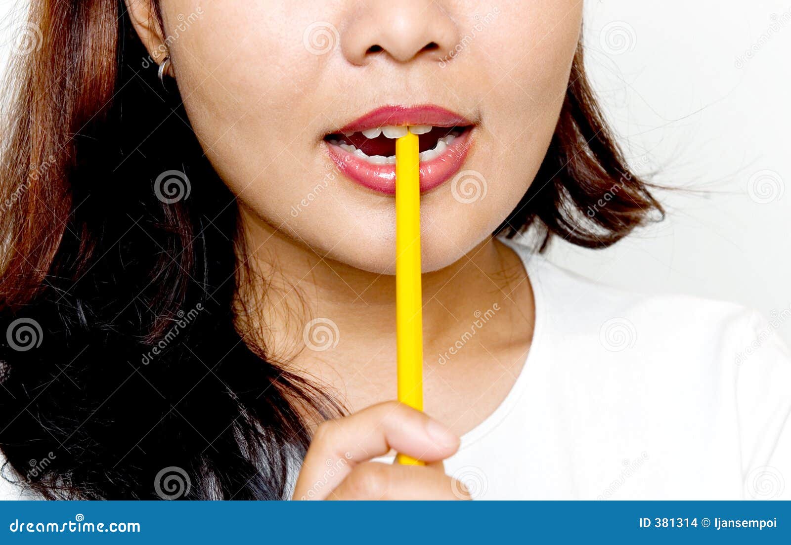 Women bite the pencil stock photo. Image of closeup, girl - 381314