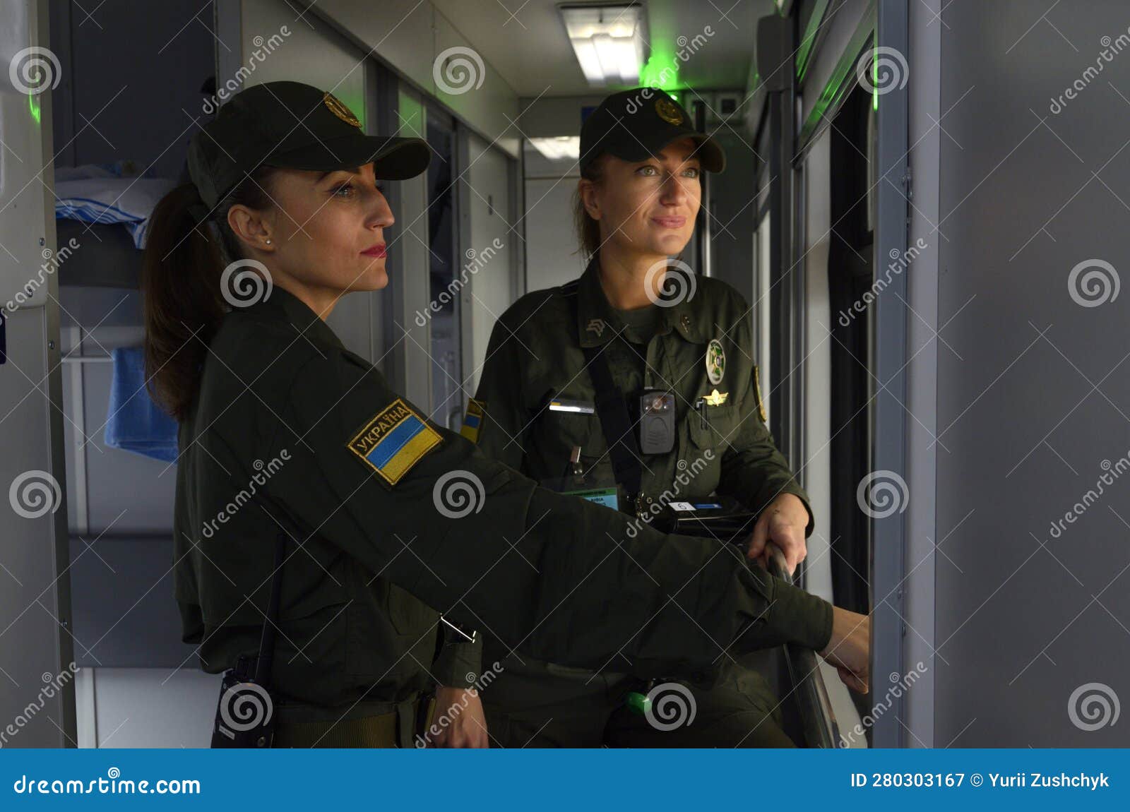 Women Border Guards in Uniform Standing in Front of a Window of a ...