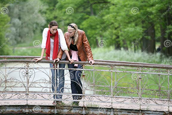 Women on the Bridge in Park Stock Image - Image of relaxing, women: 5609637