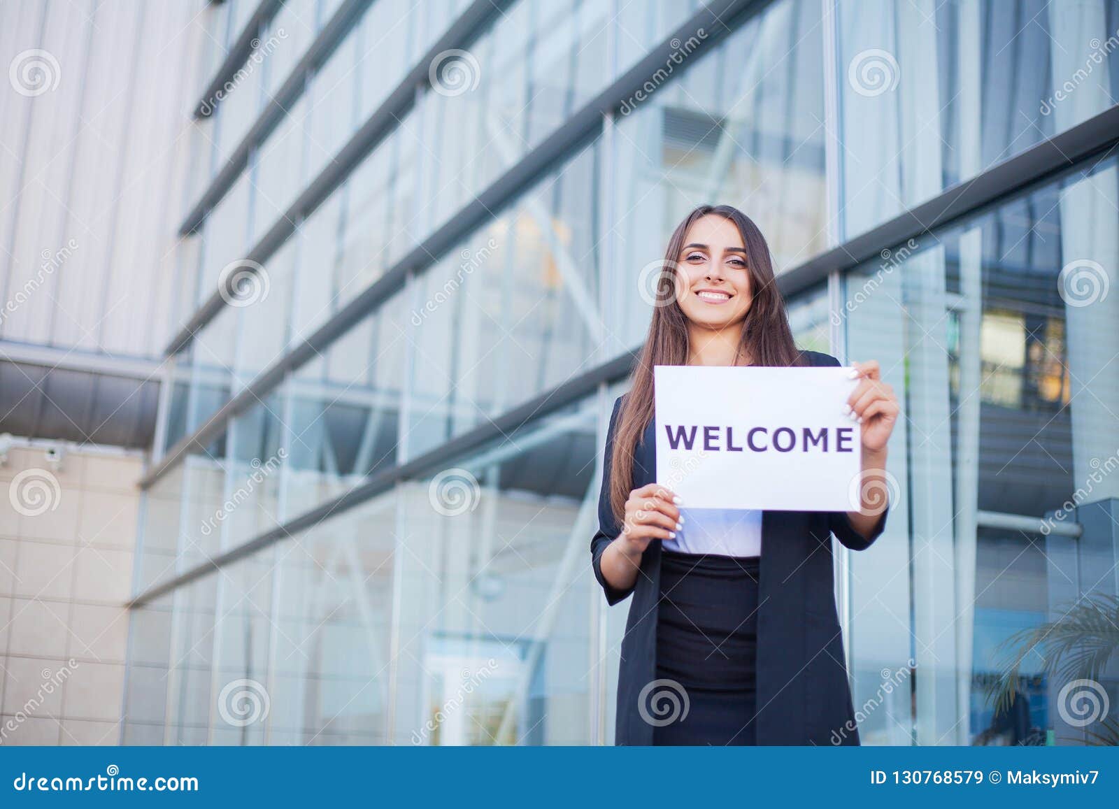 Women Business with the Poster with Welcome Message Stock Image - Image ...