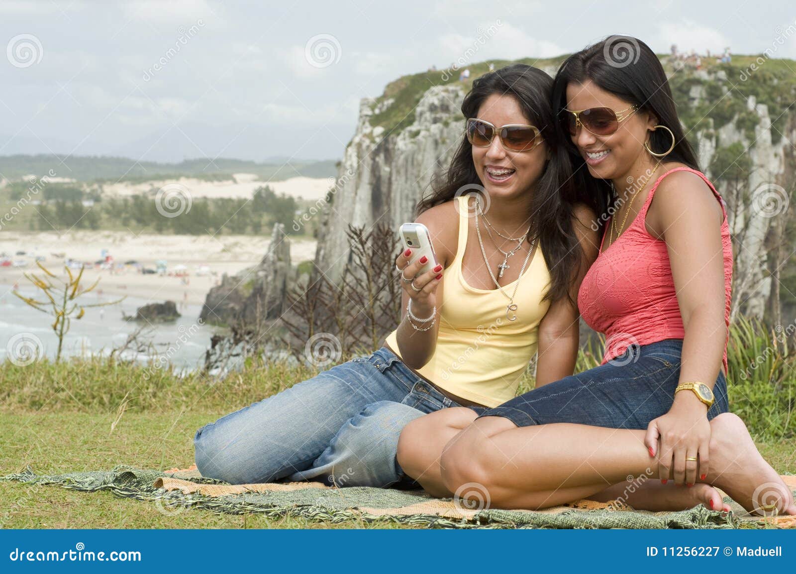 Women calling from beach stock image. Image of laughing - 11256227