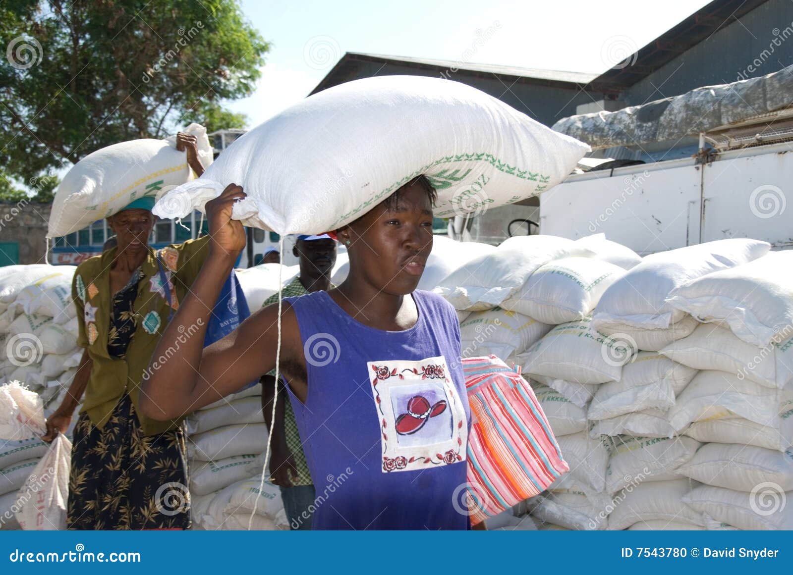 Women Carrying Food editorial image. Image of disaster - 7543780