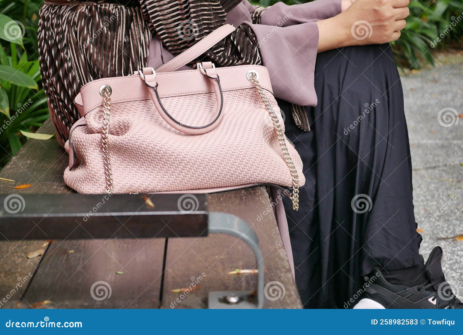 Women Carrying a Pink Purse Stock Image - Image of black, style: 258982583