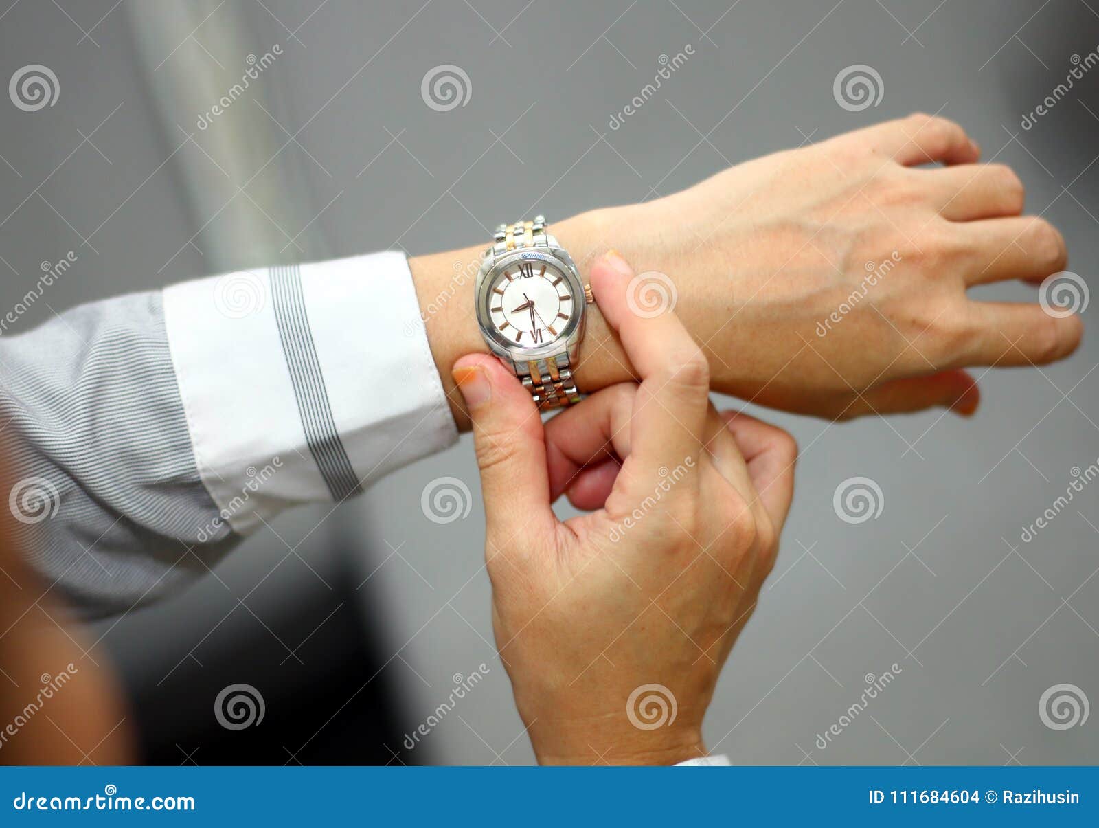 Women Checking at Time on Her Wrist Watch Stock Photo - Image of ...