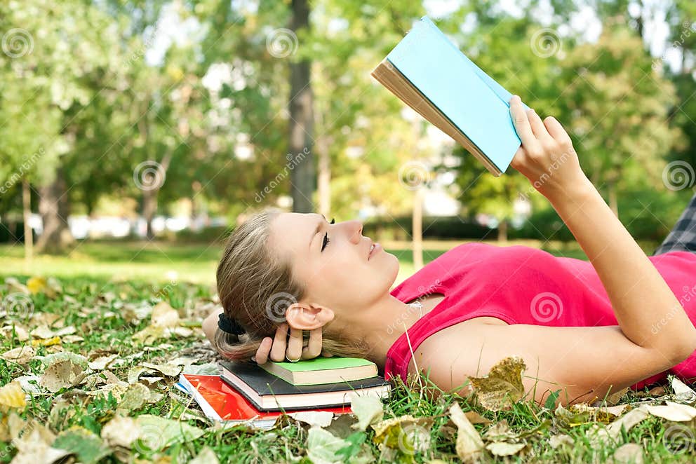 Women Concentrate on Reading Stock Image - Image of cute, outdoors ...