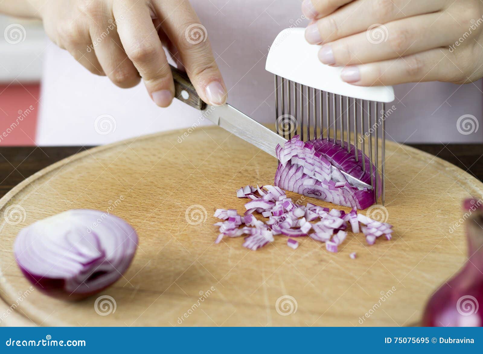 Women Cut Red Onion with a Special Device. Stock Image - Image of table ...