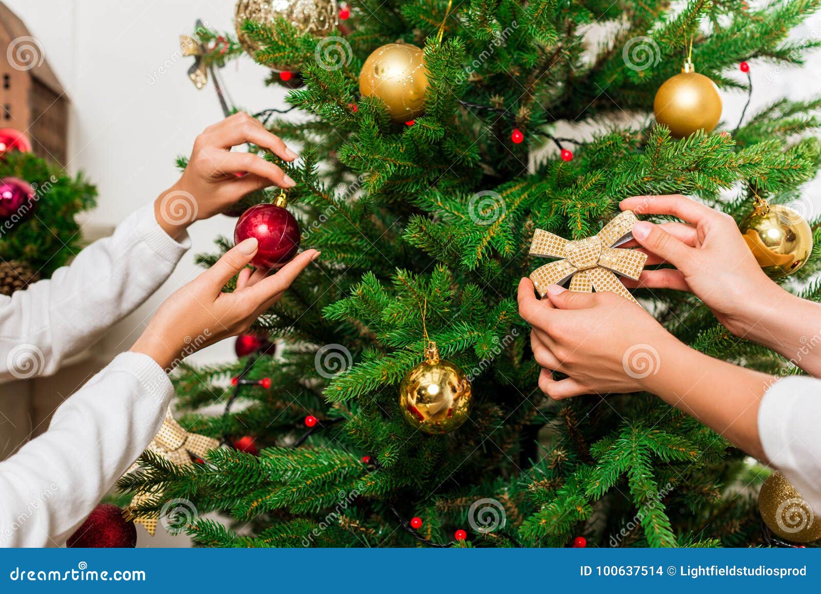 Women Decorating Christmas Tree Stock Photo - Image of celebratory ...
