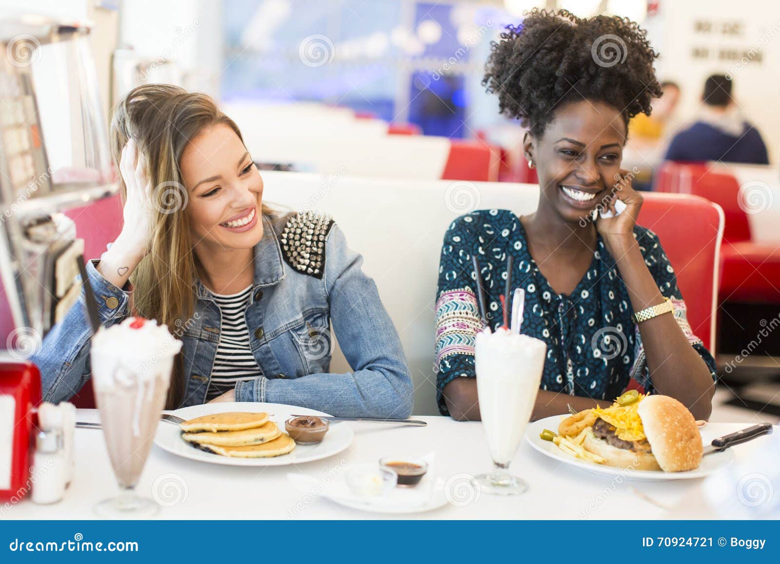Women in the diner stock image. Image of cheeseburger - 70924721