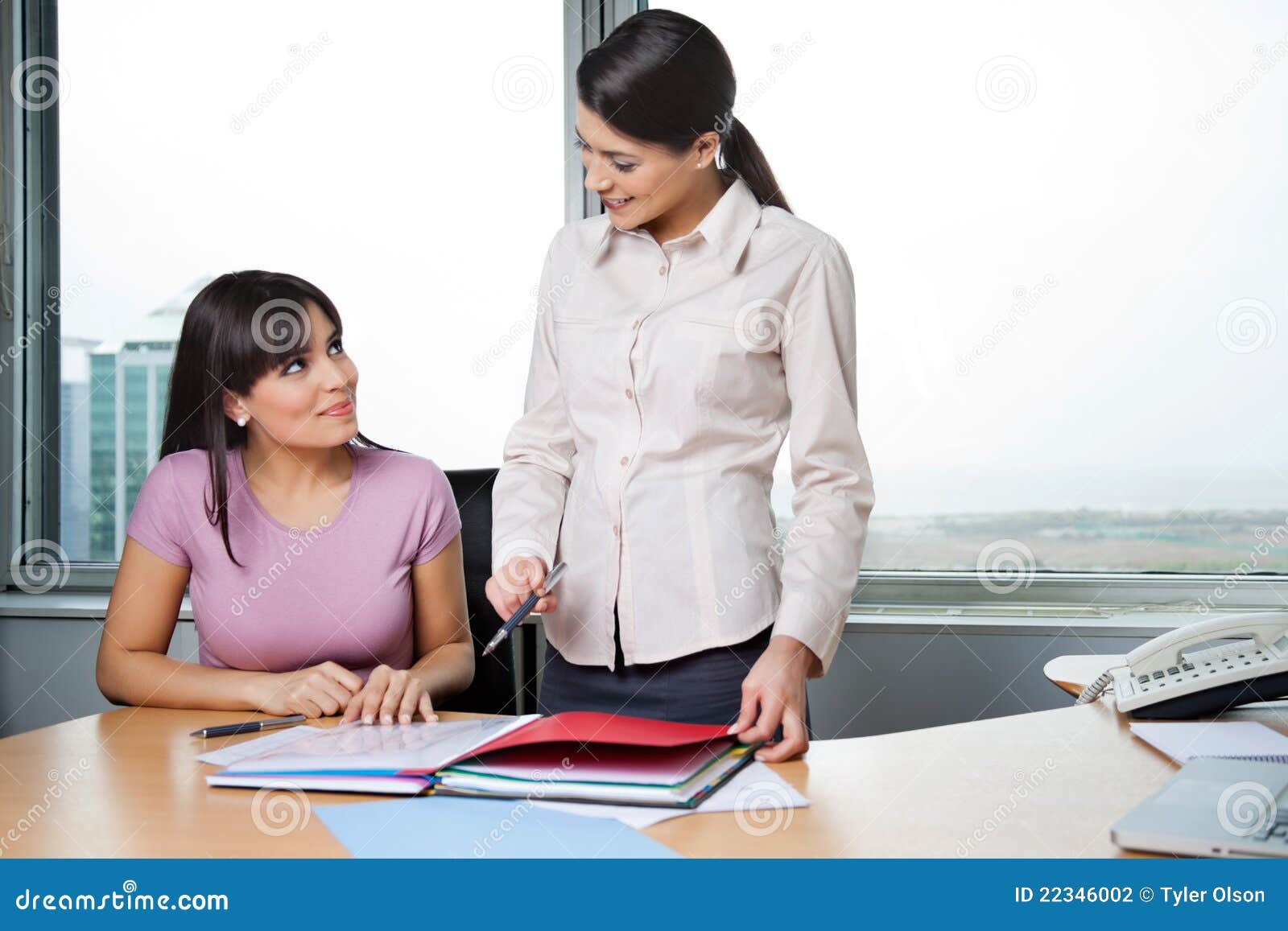 Women Discussing Business Reports Stock Photo - Image of business ...