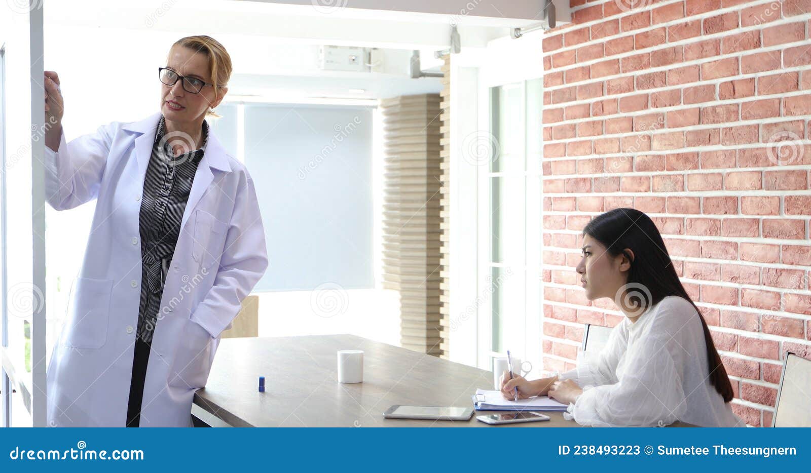 Women Doctors or Scientists are Teaching and Explaining Students and ...