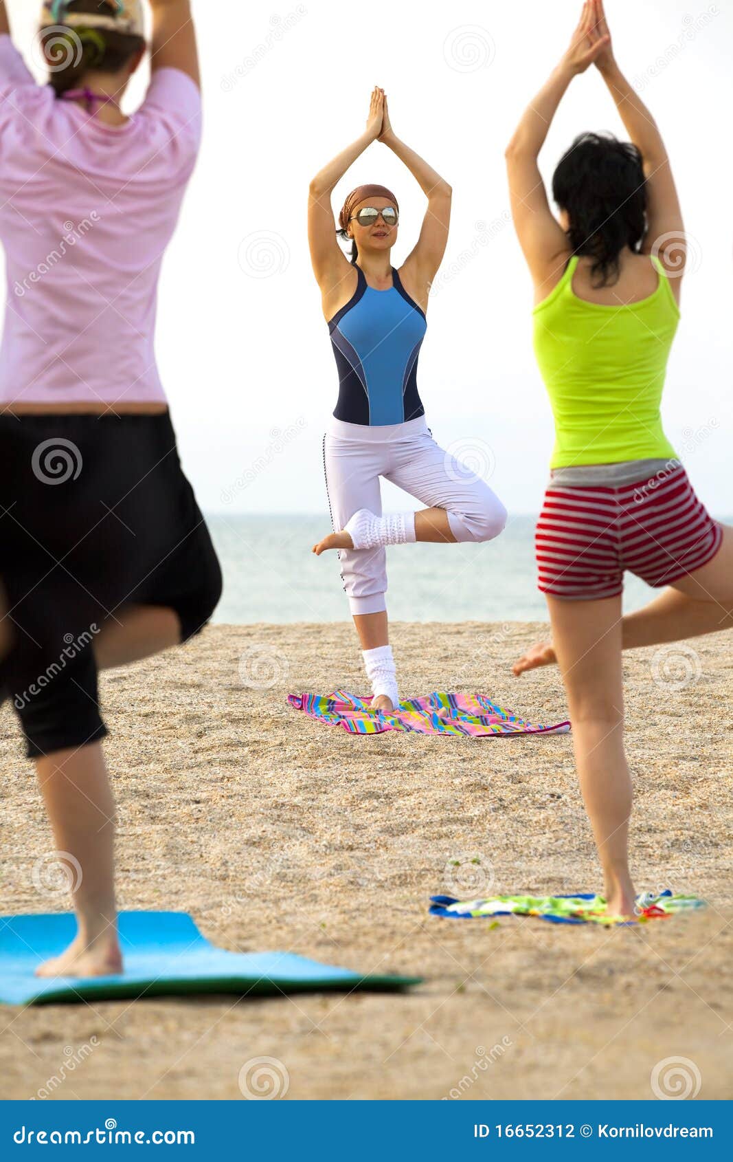 Women Doing Fitness Exercise on a Beach Stock Photo - Image of balance ...