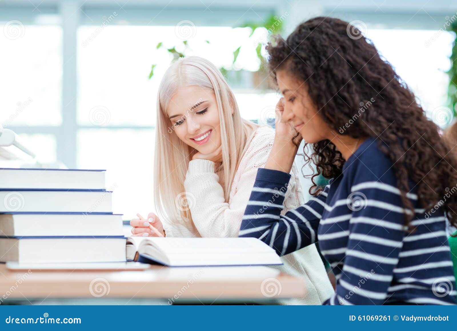 Women Doing Homework Together Stock Image - Image of literature ...