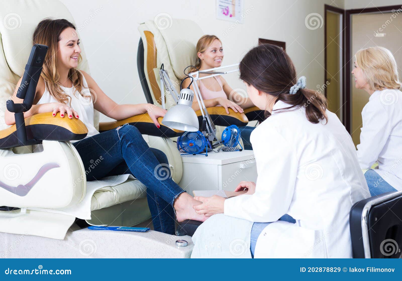 Women doing pedicure stock image. Image of pedicure - 202878829