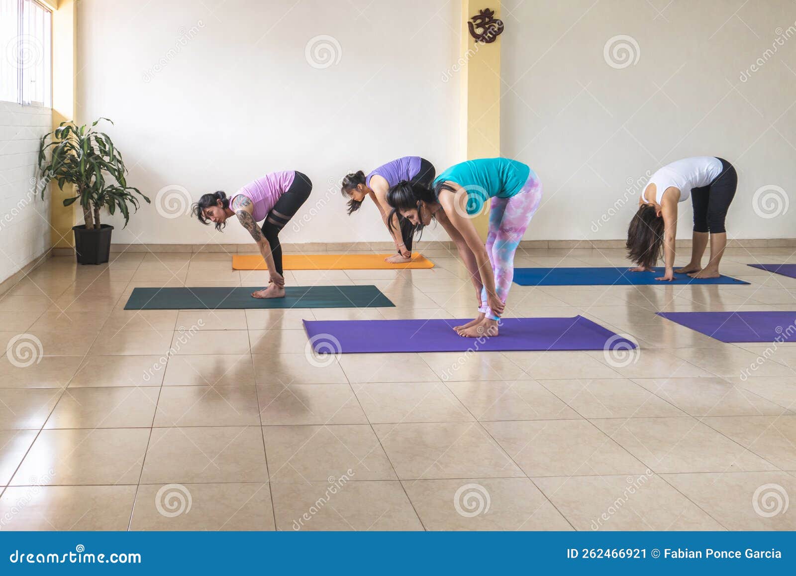 Women Doing Stretching during a Yoga Class Stock Image - Image of ...
