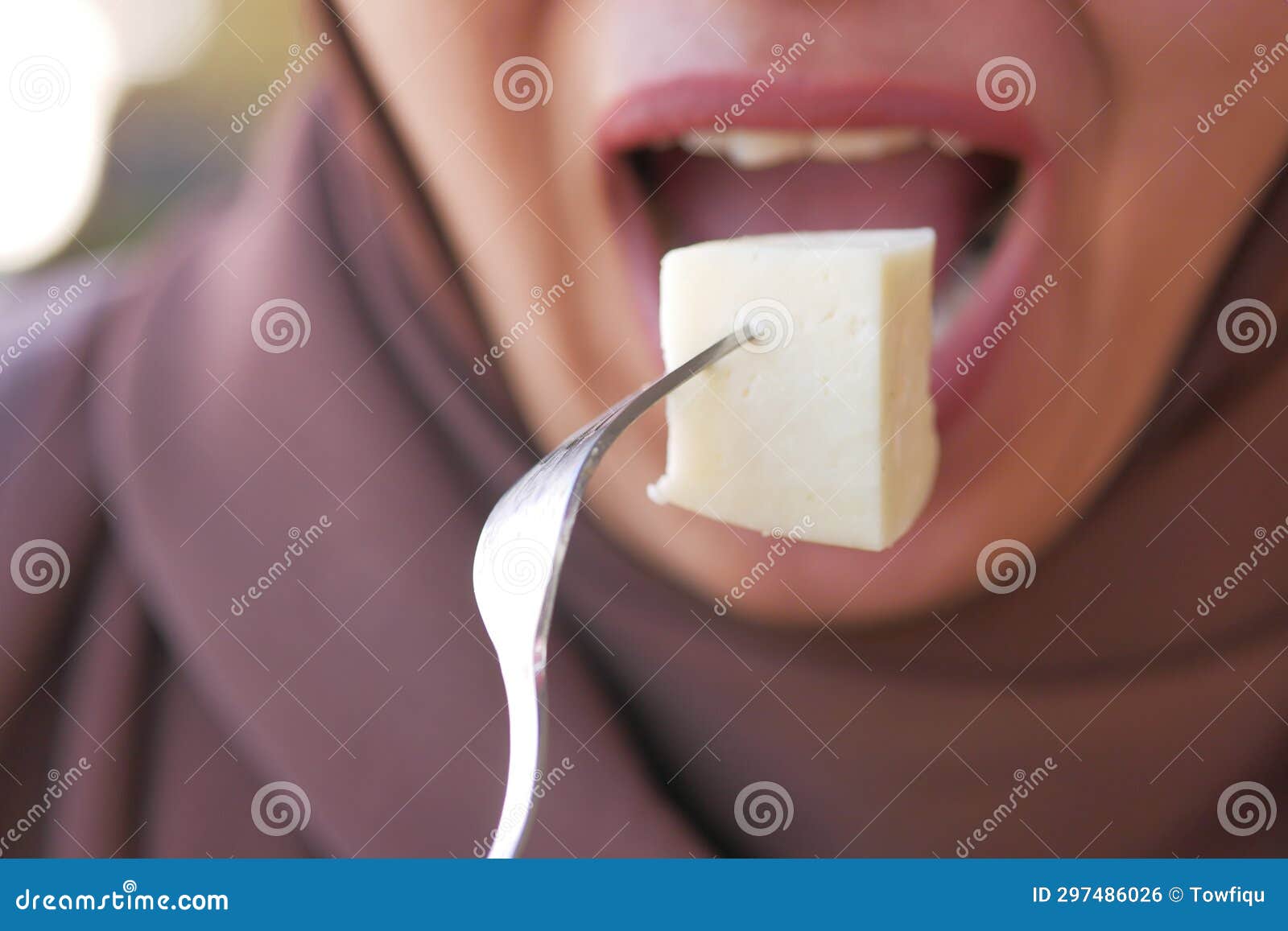 Women Eating Cheese Cubes Closeup Stock Photo - Image of mouth ...