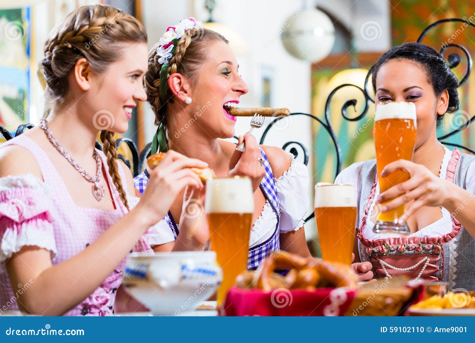 Women Eating Lunch in Bavarian Restaurant Stock Photo - Image of ...