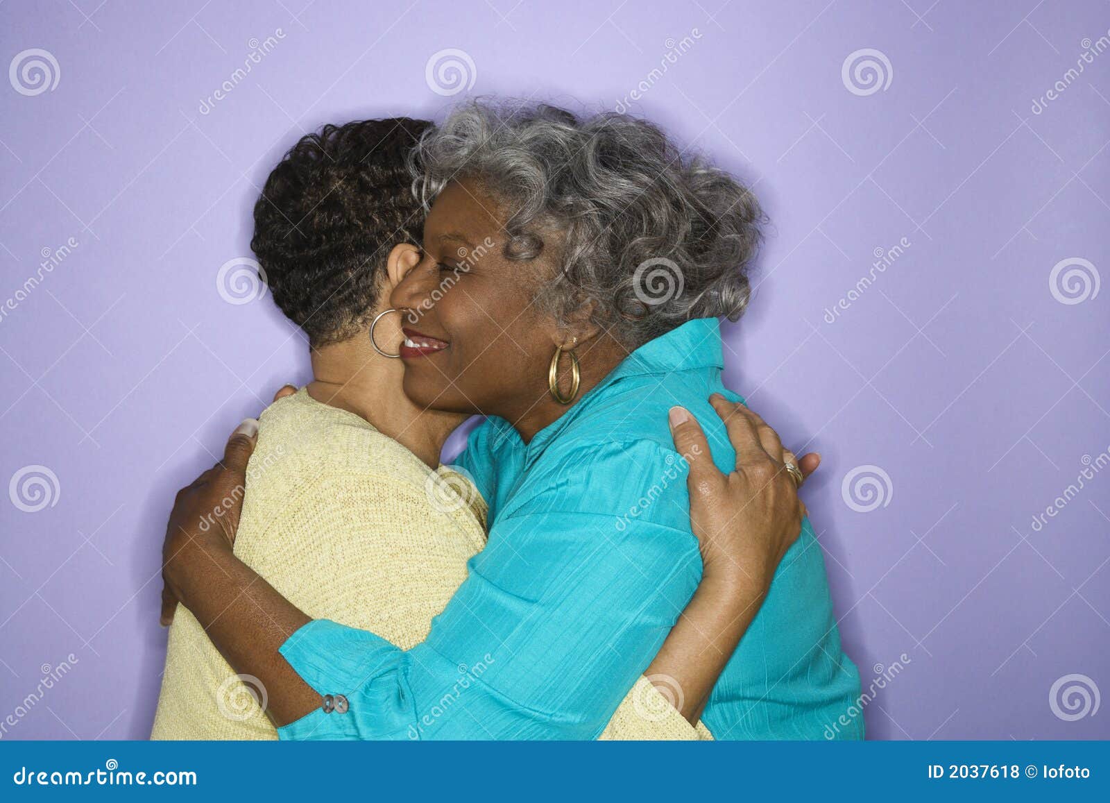 Women embracing. stock photo. Image of colour, buddy, horizontal - 2037618