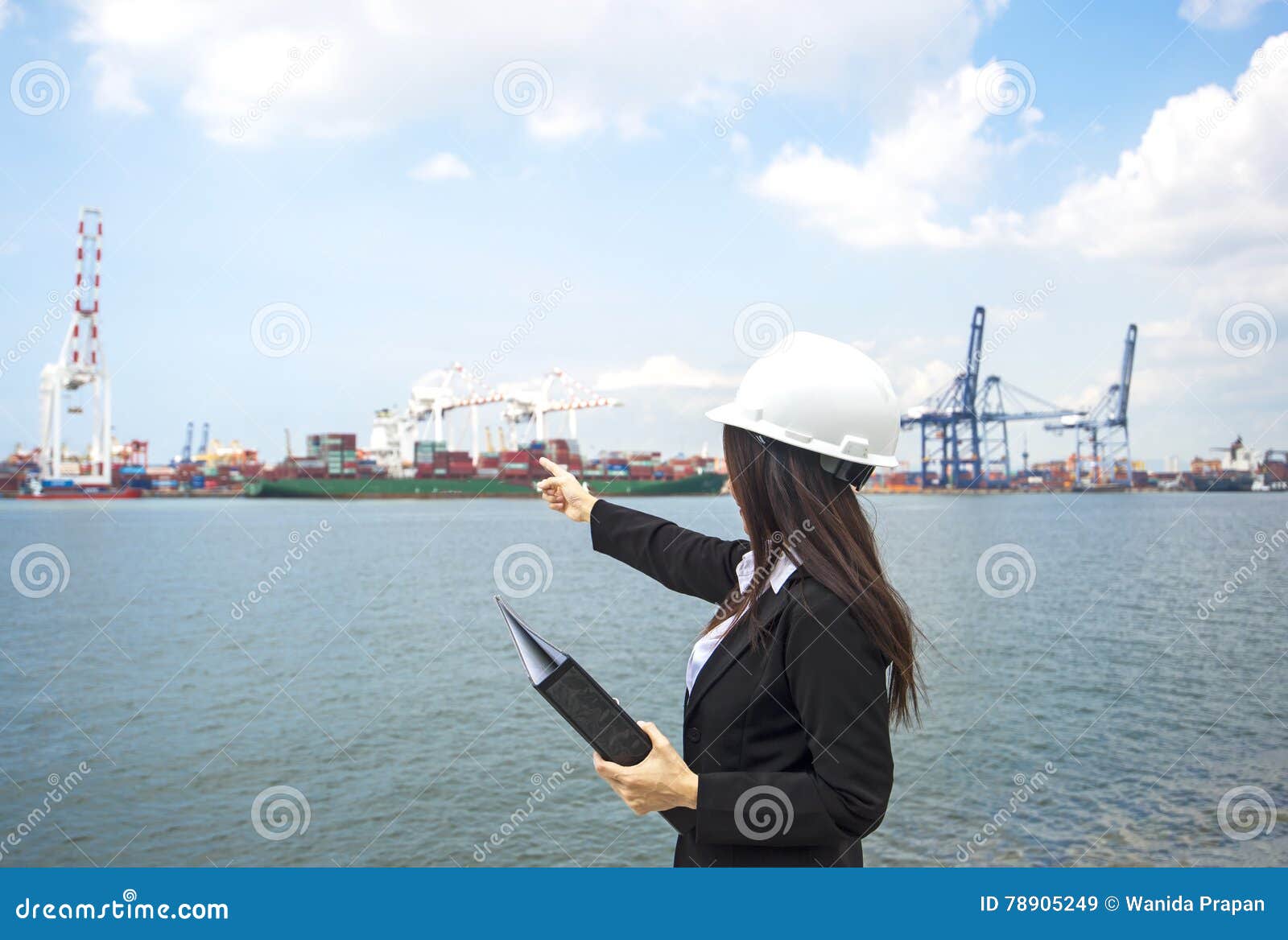 The Women Engineer Working With Container Cargo Freight Ship In ...