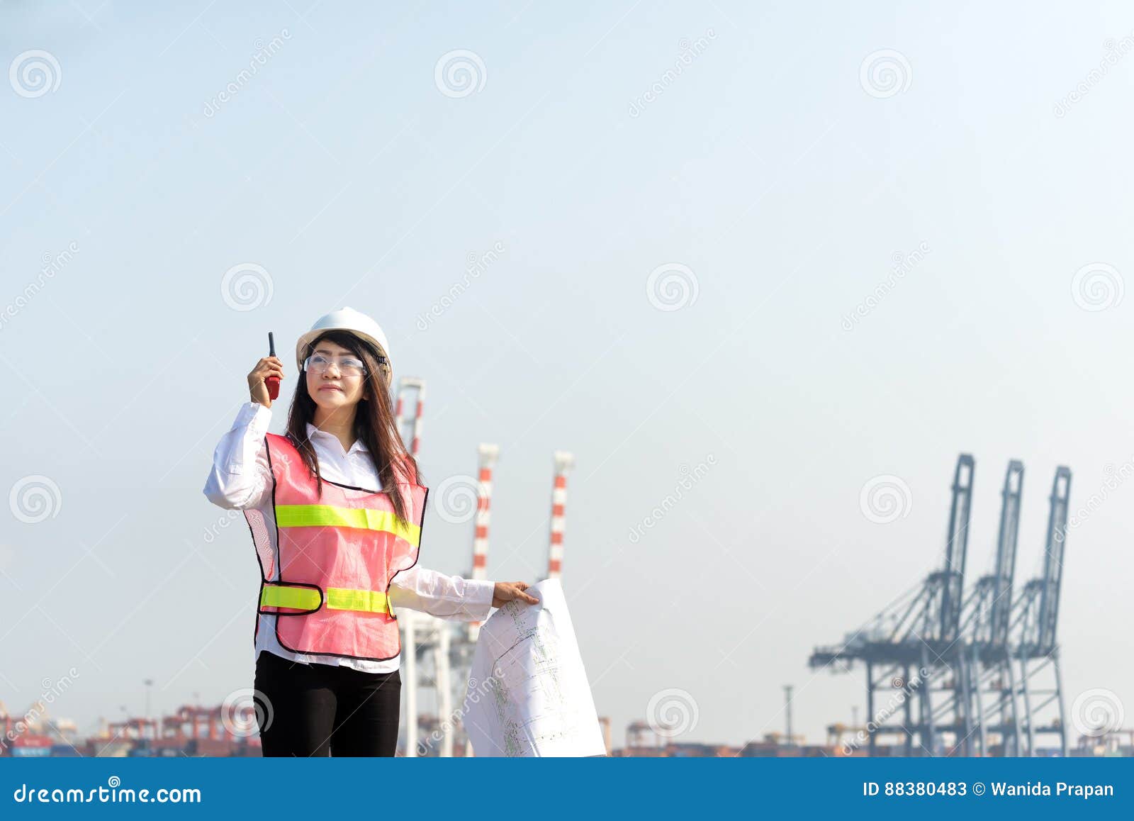 The Women Engineer Working with Container Cargo Freight Ship in ...