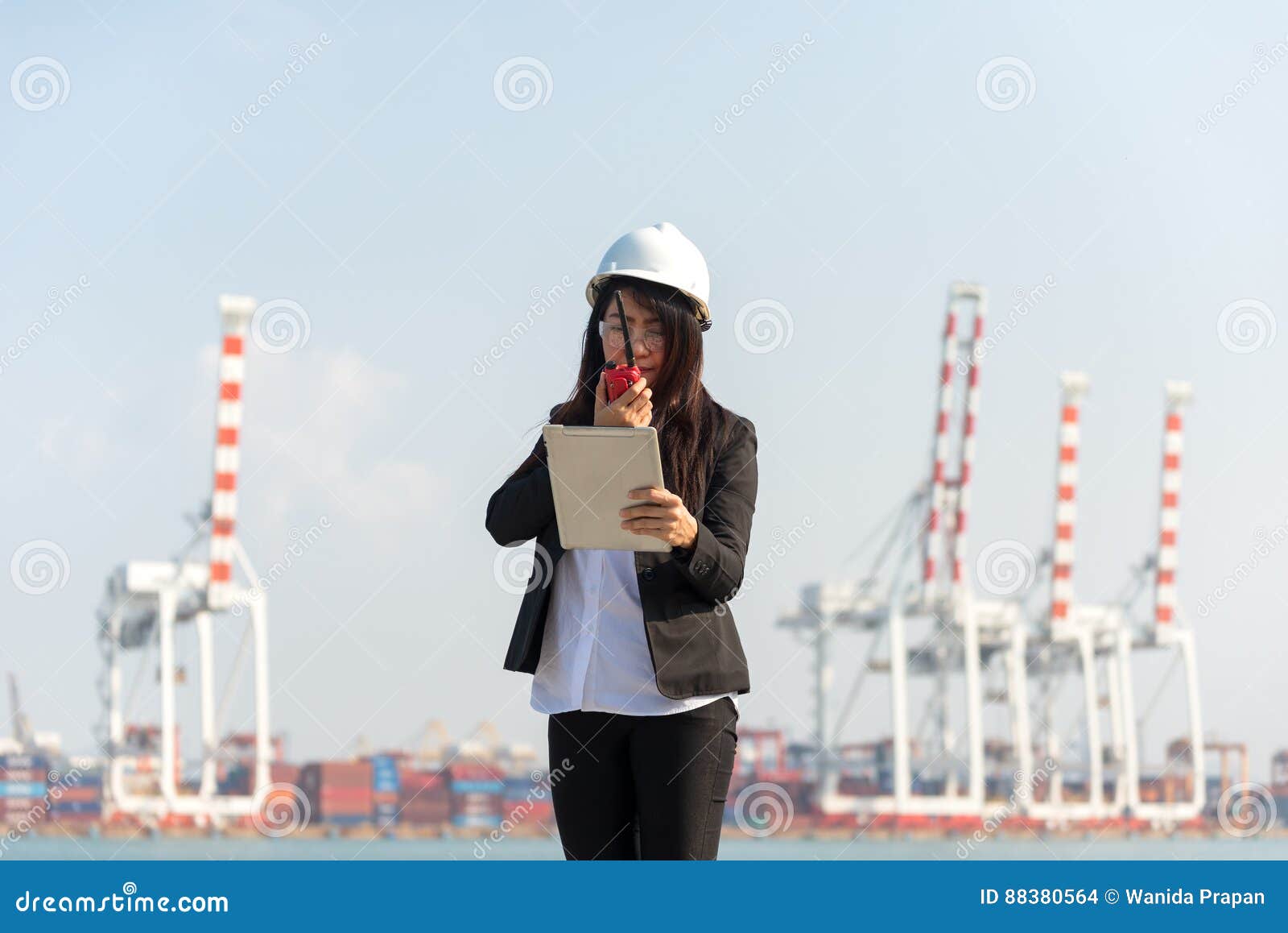 The Women Engineer Working with Container Cargo Freight Ship in ...