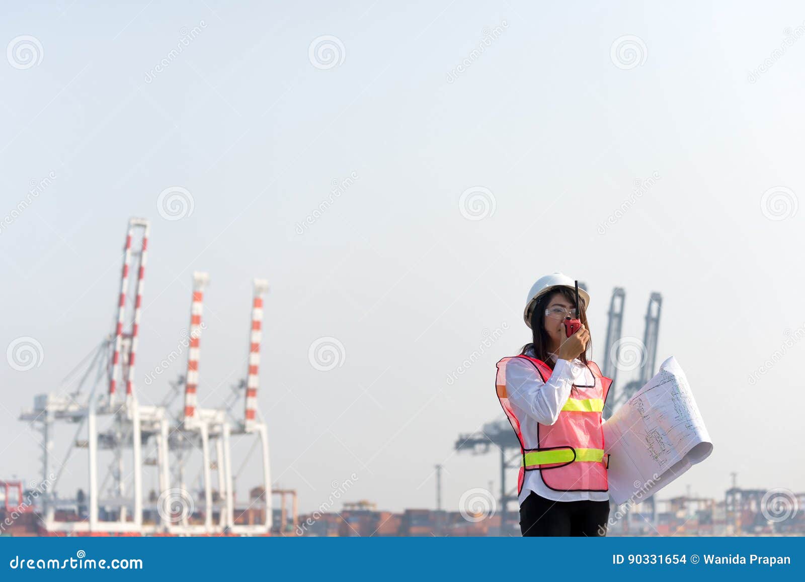 The Women Engineer Working with Container Cargo Freight Ship in ...
