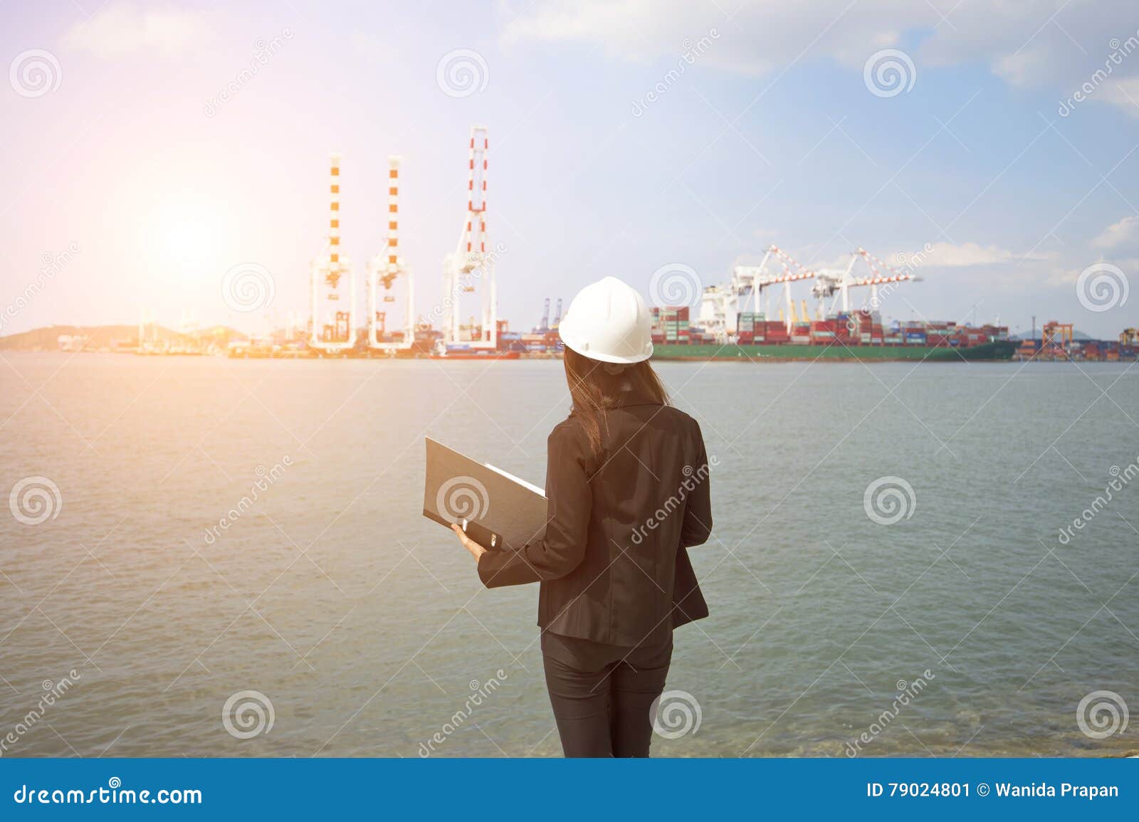 The Women Engineer Working with Container Cargo Freight Ship in ...