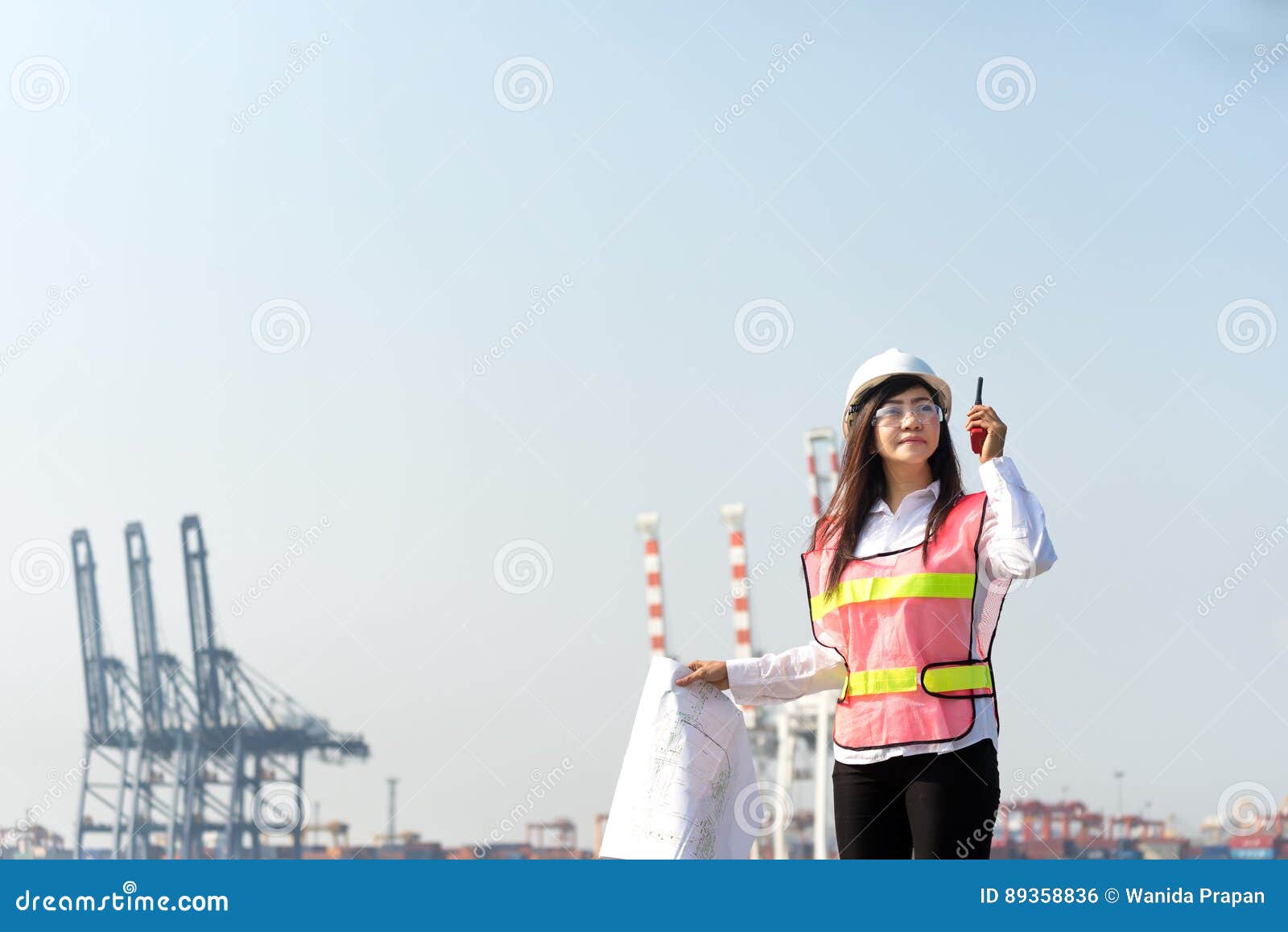 The Women Engineer Working with Container Cargo Freight Ship Stock ...