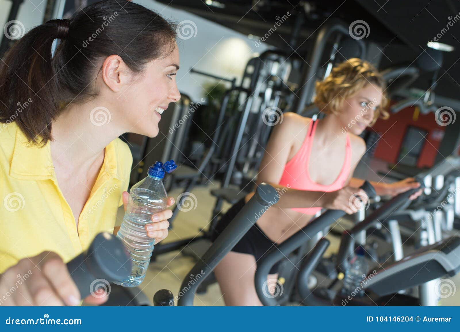 Women on Exercise Machine in Gym Stock Photo - Image of health, happy ...