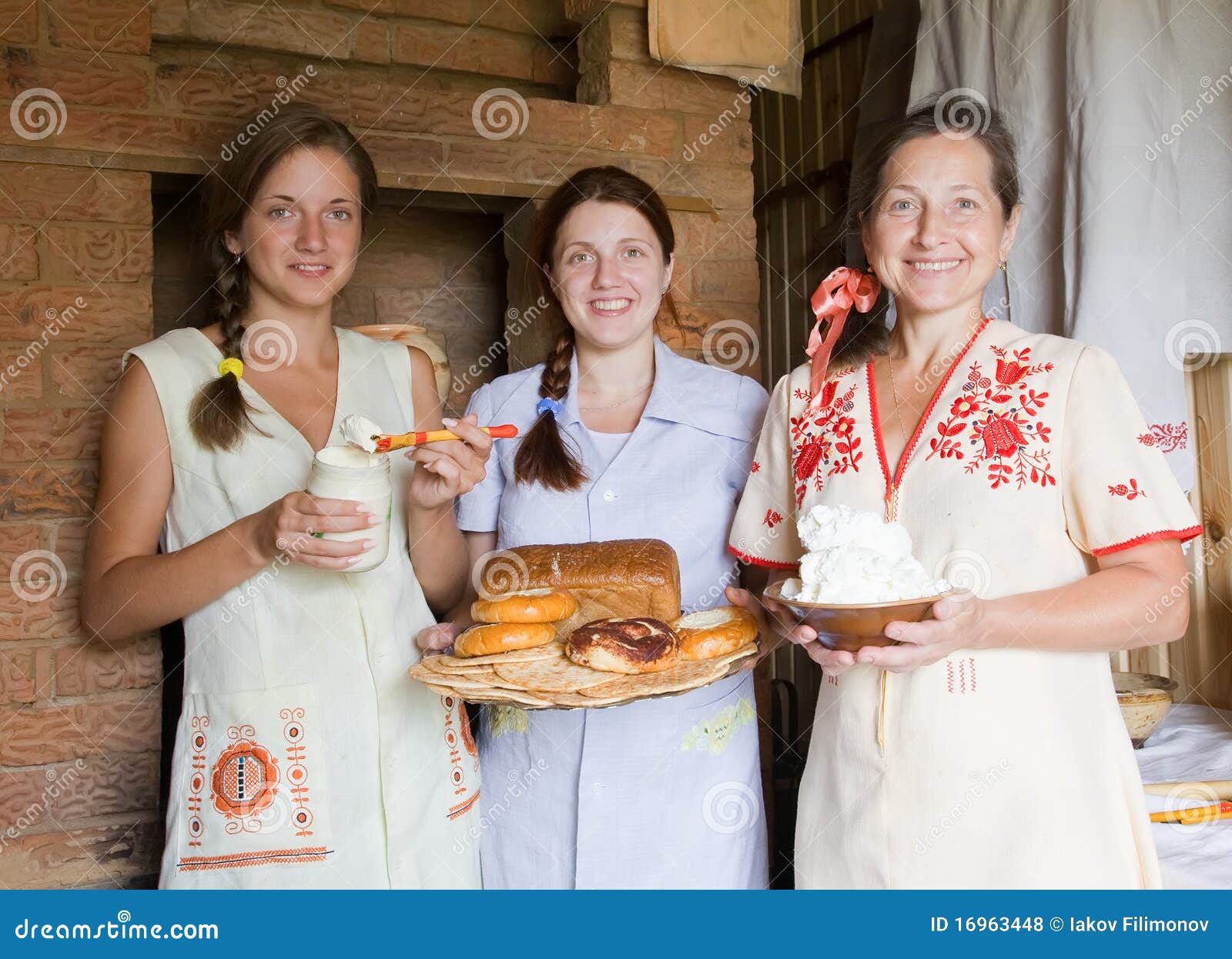 Women with farm-style meal stock photo. Image of country - 16963448