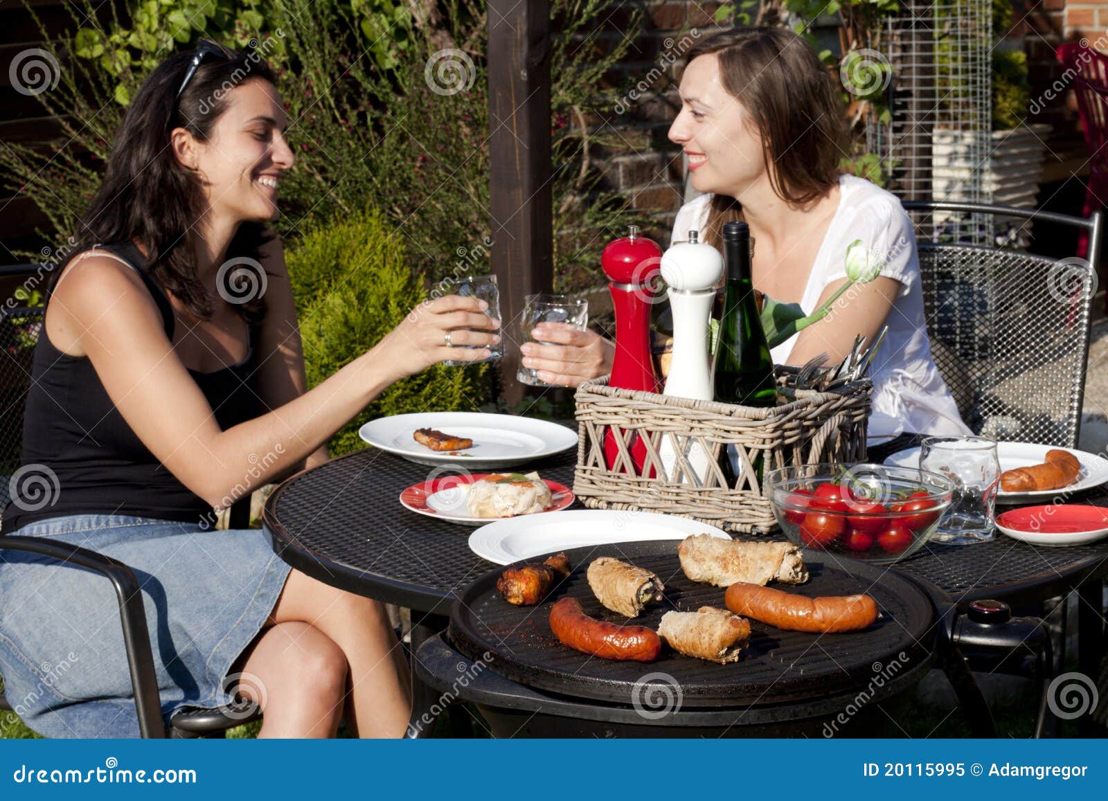 Women in the garden stock image. Image of brunette, gardening - 20115995