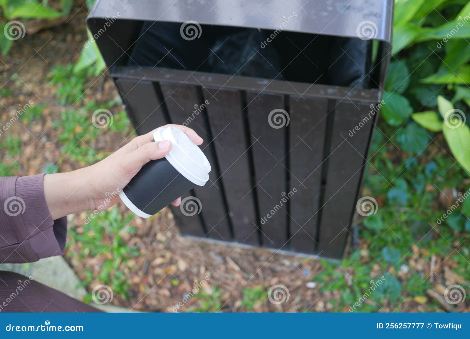 Women Hand Throwing an Empty Coffee Paper Cup in the Garbage Trash or ...