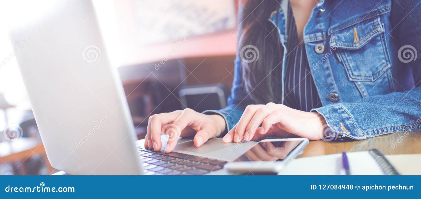 Women Hand are Using a Computer Laptop in the Office.on the Table are ...