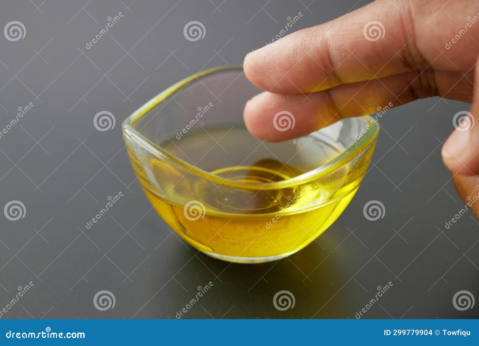 Women hand using olive oil stock photo. Image of hands - 299779904